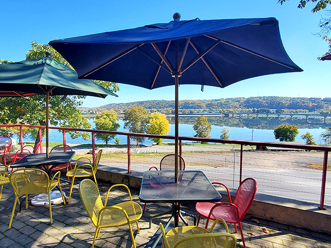 Colorful chairs and water views make outdoor dining at Skeeter's twice as nice. Nature's backdrop pairs perfectly with smoked meats—it's science.
