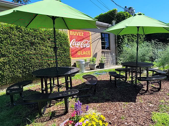 The garden patio offers a peaceful retreat from the world. Those umbrellas aren't just for shade—they're happiness canopies.