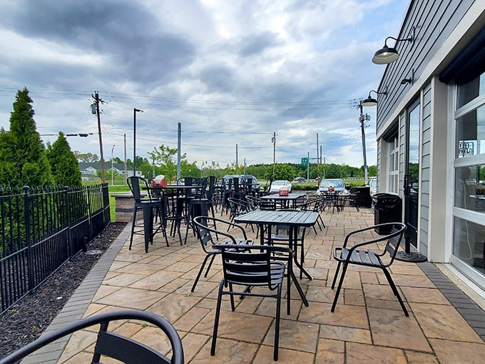 The outdoor patio – where summer breezes carry smoky aromas and the only acceptable interruption to eating is more eating.