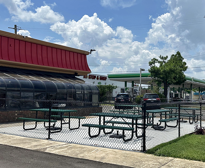 The outdoor seating area—where strangers become friends united by the universal language of "Did you try the Sweet Spicy Love sauce?"