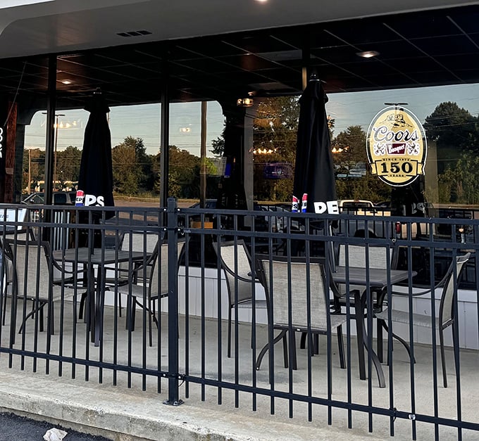 The outdoor patio – where fresh air meets fresh food. Simple metal tables invite you to enjoy your meal under the South Carolina sky.