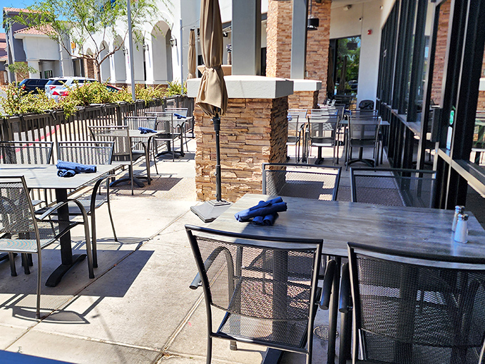 The outdoor seating area—where desert breezes meet seafood feasts, proving you don't need an ocean view to enjoy the ocean's bounty.