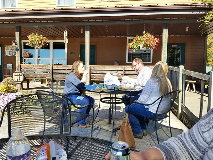 The outdoor seating area—where strangers become friends over exceptional sandwiches and the shared joy of a culinary discovery.