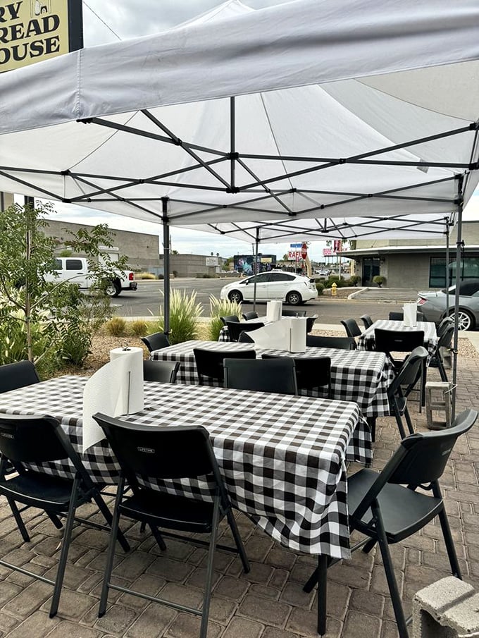 Outdoor seating under white canopies offers a chance to enjoy your fry bread feast while soaking up that famous Arizona sunshine.