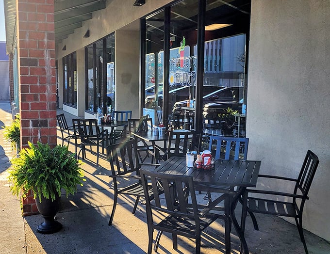 Outdoor seating for those who prefer their coffee with a side of fresh air—urban breakfast al fresco at its finest.