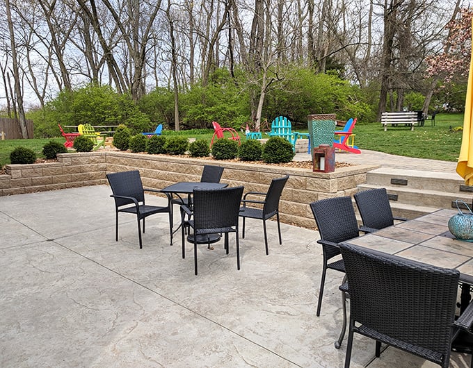 The tiered outdoor seating area extends the dining experience into nature, where fresh air serves as the perfect digestif.