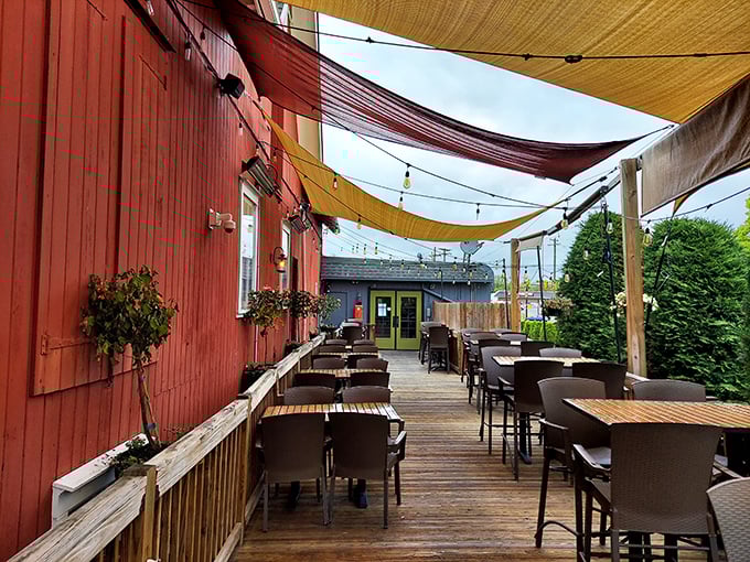 The outdoor patio—where colorful canopies, fresh air, and wooden tables create the perfect stage for summer dining performances.