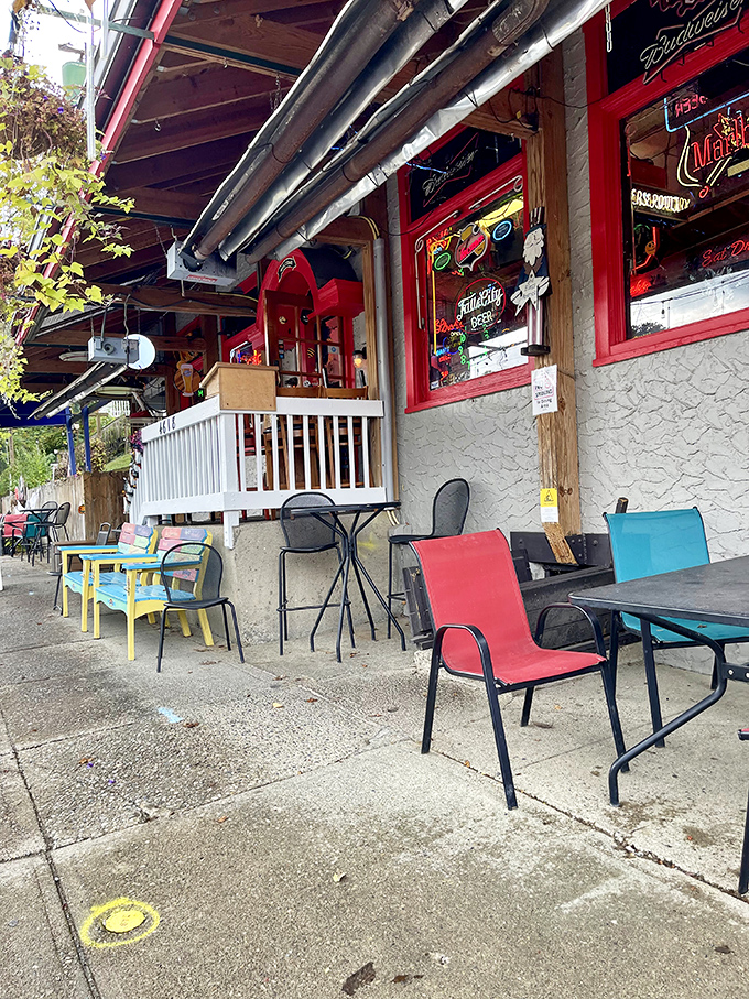 The outdoor seating area isn't trying to impress anyone with matching furniture—it's too busy providing the perfect spot to devour your burger while people-watching.