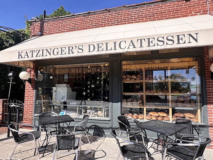 Outdoor seating beckons under the iconic awning—the perfect spot to tackle a sandwich that requires both strategy and napkins.