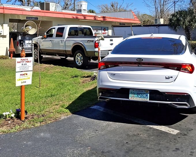 Cars queue up like pilgrims at a shrine. In Gainesville's dining landscape, Mac's Drive-Thru remains the great equalizer.