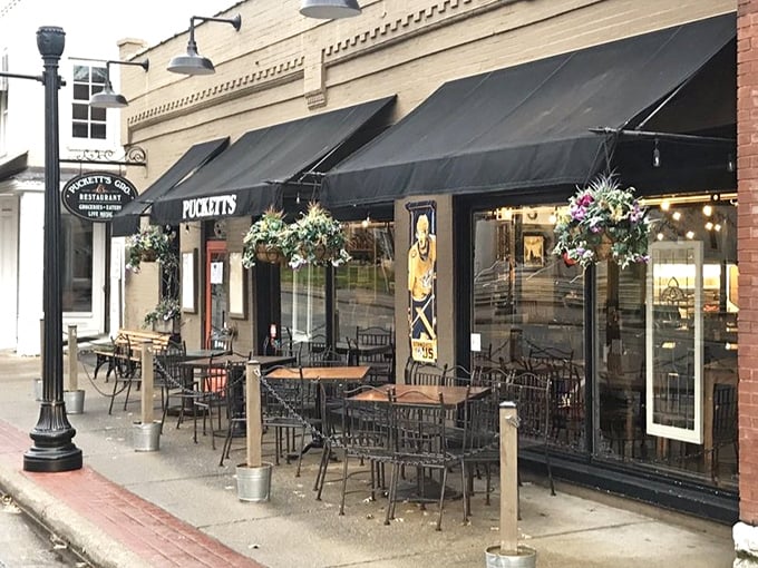 Sidewalk seating under black awnings offers a front-row seat to Franklin's historic Main Street – the perfect perch for people-watching between bites of Southern comfort.