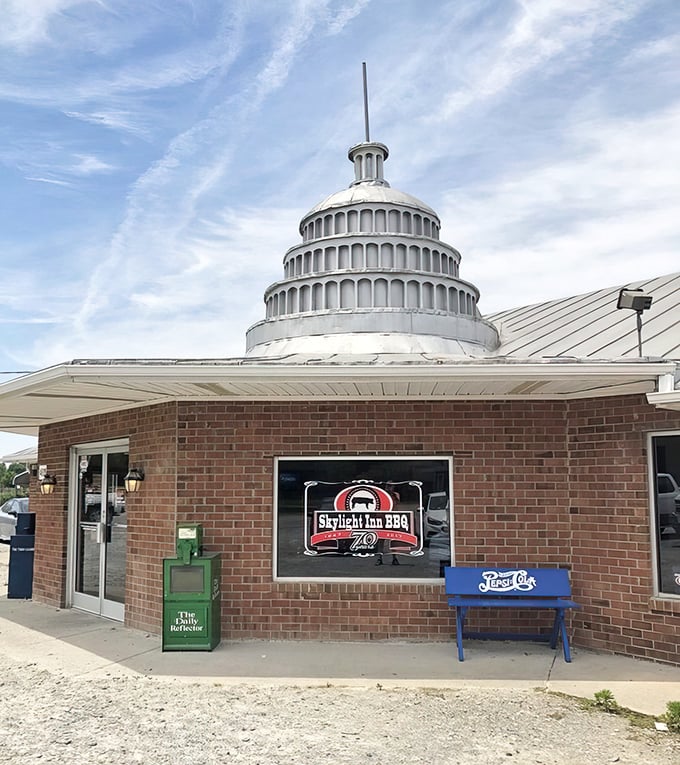 That silver dome isn't architectural showing off—it's a landmark visible for miles, guiding hungry travelers to one of America's barbecue holy sites.