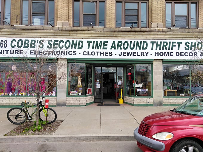 Cobb's storefront welcomes bargain hunters with the promise of treasures within. The thrill of the hunt begins at these green doors.