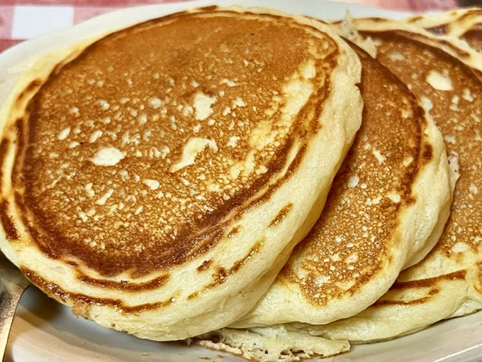 Pancakes so fluffy they practically hover above the plate—the kind that make you wonder if your homemade attempts have been pancakes at all.