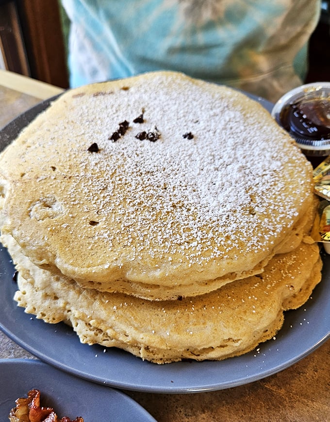 Pancakes so fluffy they could float away if not anchored by powdered sugar. Breakfast's answer to cloud nine.