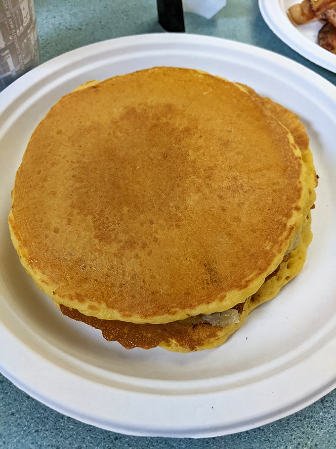 Pancakes with the perfect golden-brown hue – the kind that make you debate whether they deserve maple syrup or are perfect just as they are.