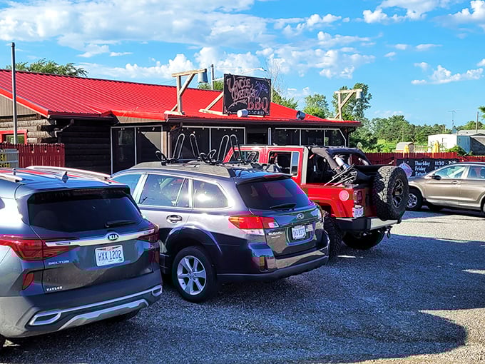 A packed parking lot is the universal sign language for "you've found the good stuff"—no GPS needed when you follow the crowd to great BBQ.