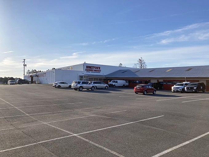The unassuming exterior of Hometown Farmers Market – Pennsylvania's temple of treasures hiding in plain sight, with a parking lot that fills before dawn.
