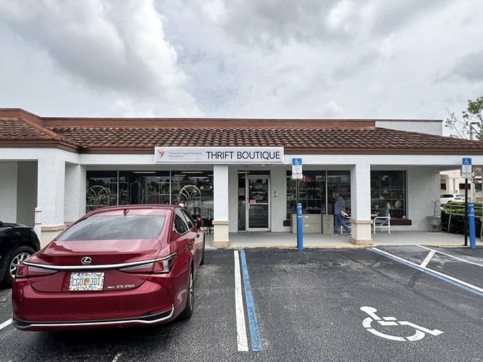 Even the parking lot screams "Florida thrift store chic"—where Lexus drivers and bargain hunters unite in the universal quest for a great deal.