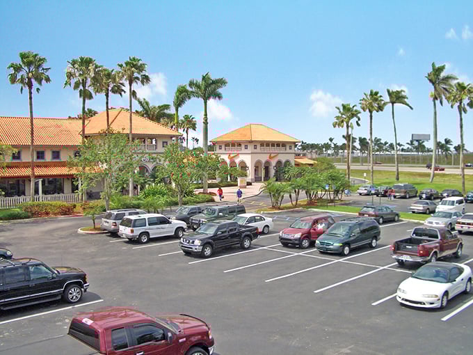 The ample parking lot—a rare Florida miracle where finding a spot doesn't require vulture-like circling or advanced parallel parking skills.