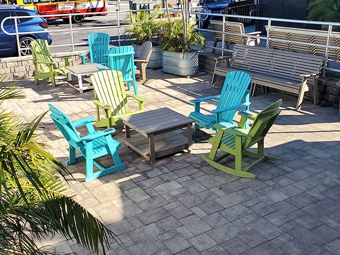 Colorful Adirondack chairs saying "stay awhile" – and with this view, why wouldn't you?