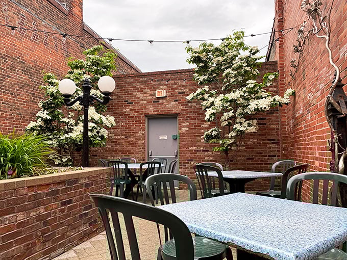 String lights illuminate the charming brick-walled patio where you can enjoy wings under Pennsylvania's open sky.