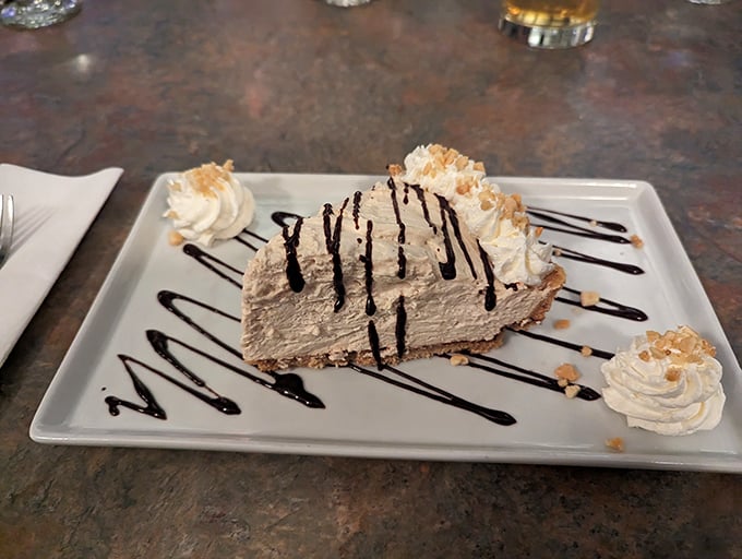 The peanut butter pie finale: a sweet symphony of creamy and crunchy textures. Dessert isn't just an afterthought here—it's the encore performance.