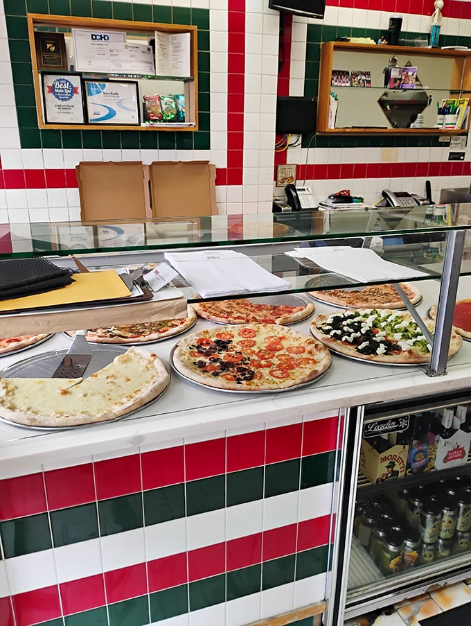 Decision paralysis has never looked so delicious. The display case of ready-to-go slices makes choosing your pizza an exquisite torture.