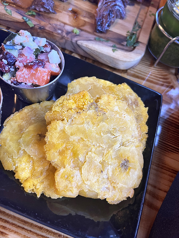 Fried plantains that crackle with tropical sweetness, paired with a vibrant salsa that brings Florida's Latin influences front and center.