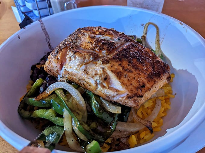 This salmon bowl brings healthy eating to diner territory without sacrificing an ounce of flavor – a culinary diplomat between worlds.