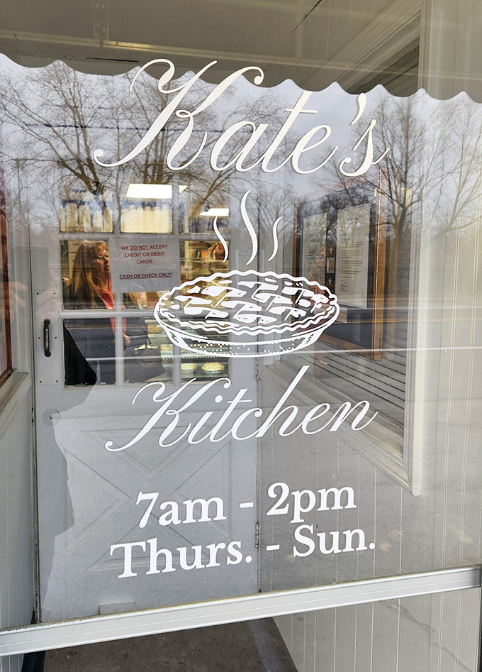 The window tells the story: a pie silhouette that serves as a beacon to hungry travelers. Those hours are worth committing to memory.
