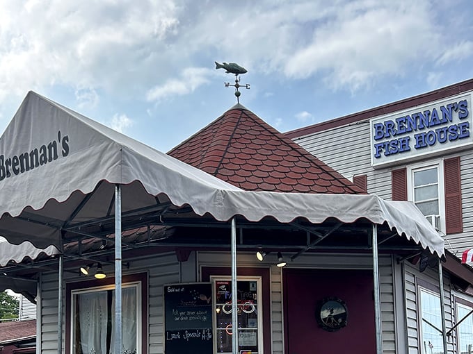 That fish weathervane isn't just decoration—it's pointing the way to some of Ohio's finest seafood, standing guard over a building that's become a landmark for food lovers.