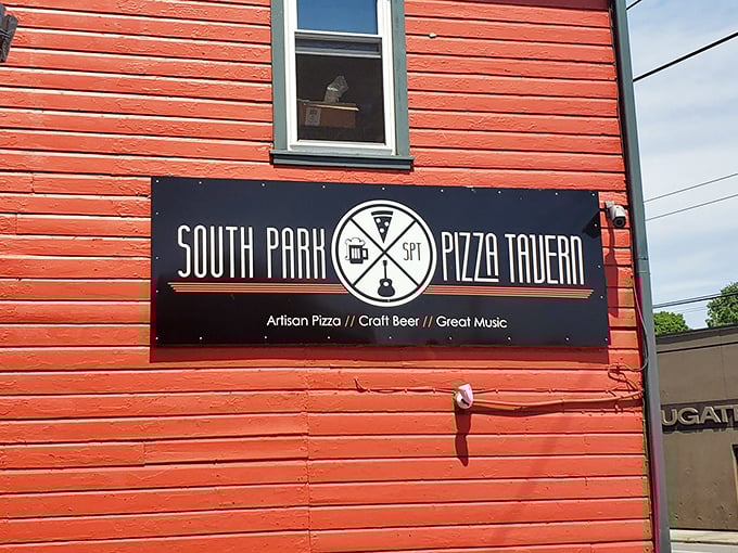The sign promises three essentials of happiness – artisan pizza, craft beer, and great music – a trinity of pleasure as straightforward as it is irresistible.