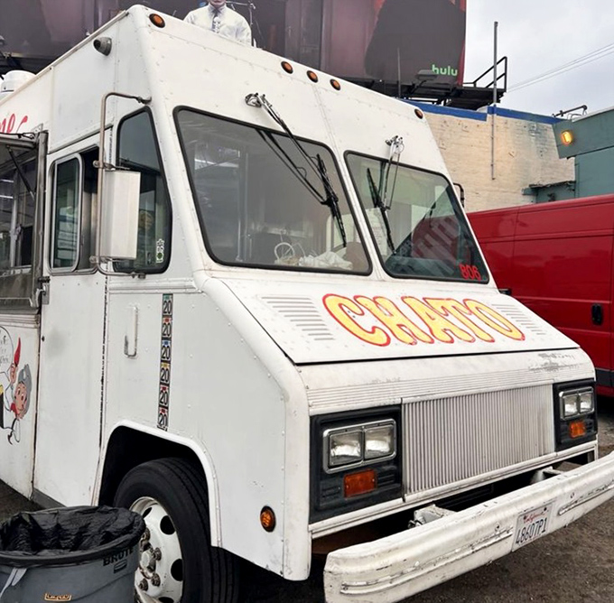 Even in daylight, the "CHATO" emblazoned truck stands proud—a humble chariot carrying some of the city's most extraordinary flavors.