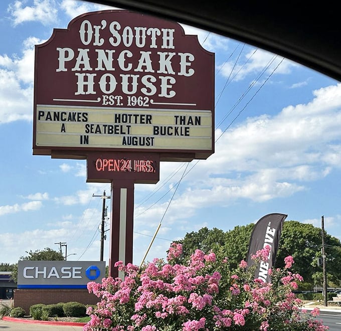 "Pancakes hotter than a seatbelt buckle in August"—the marquee sign that perfectly captures Texas humor and the promise of what awaits inside.