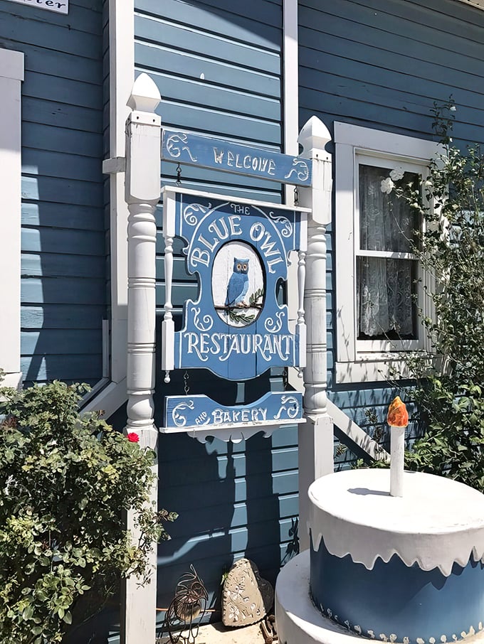 The Blue Owl sign promises what awaits inside—a restaurant and bakery where the owl mascot wisely oversees generations of satisfied customers.