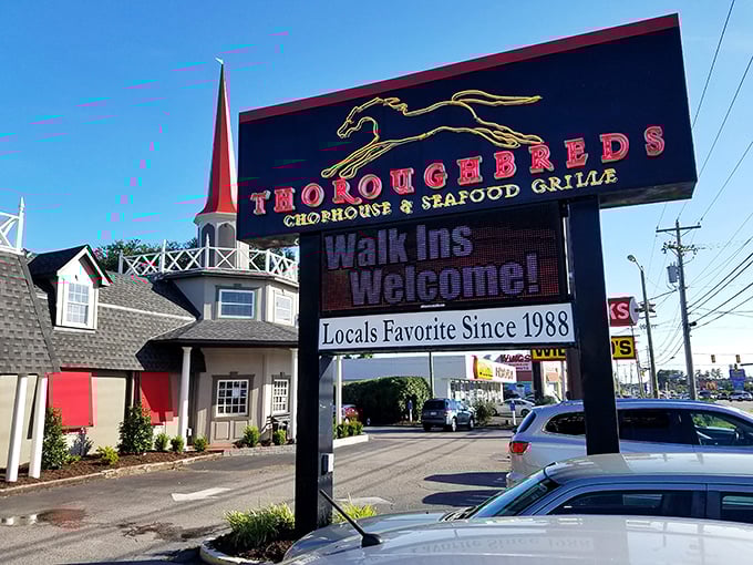 "Walk-ins Welcome!" proclaims the sign, while the golden horse silhouette races across the top. A local favorite since 1988, this sign has guided hungry patrons for decades.