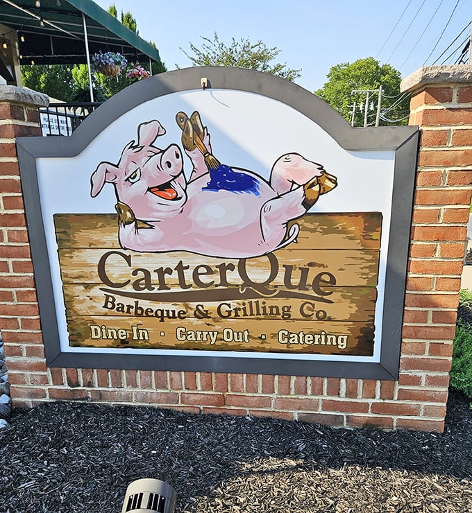 The playful pig sign welcomes hungry visitors – a whimsical guardian announcing you've arrived at a place that takes fun seriously.