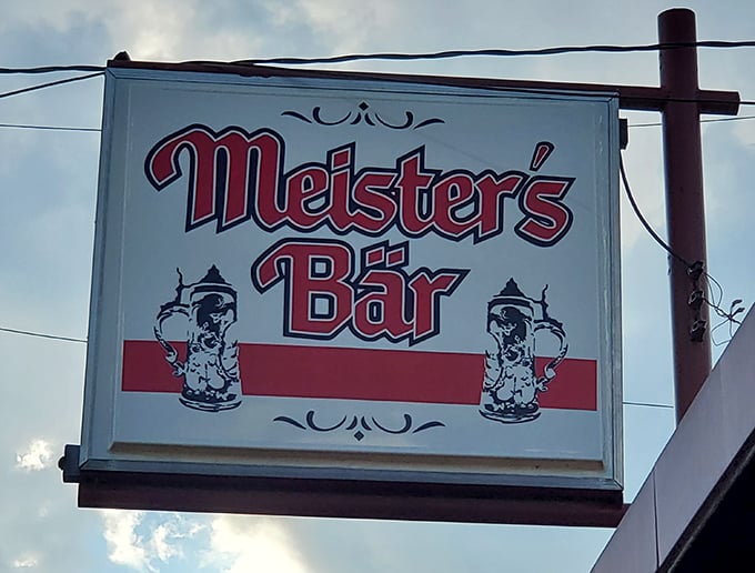 The classic sign with its beer steins tells you everything you need to know – this place honors tradition while serving up good times.