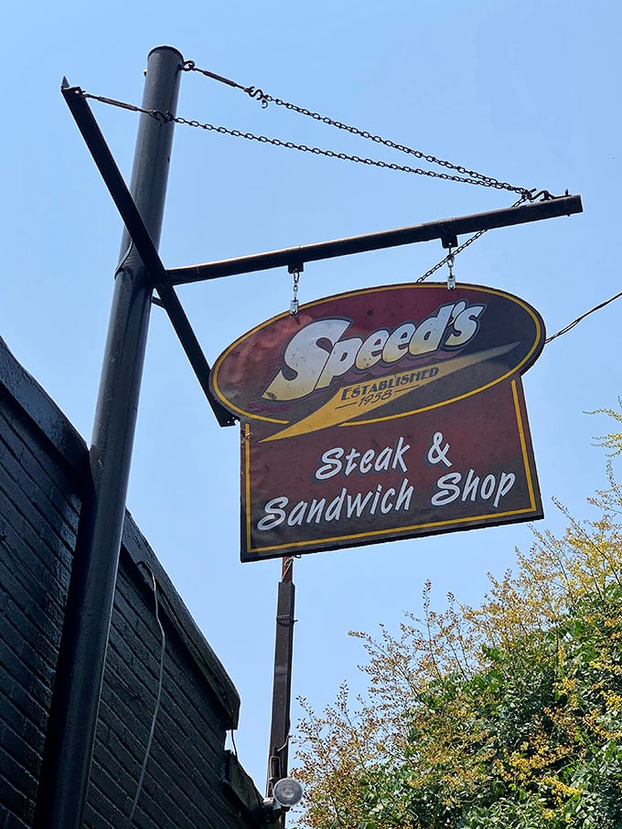 The hanging sign serves as a beacon for the sandwich-obsessed. Like a lighthouse guiding hungry ships to shore.