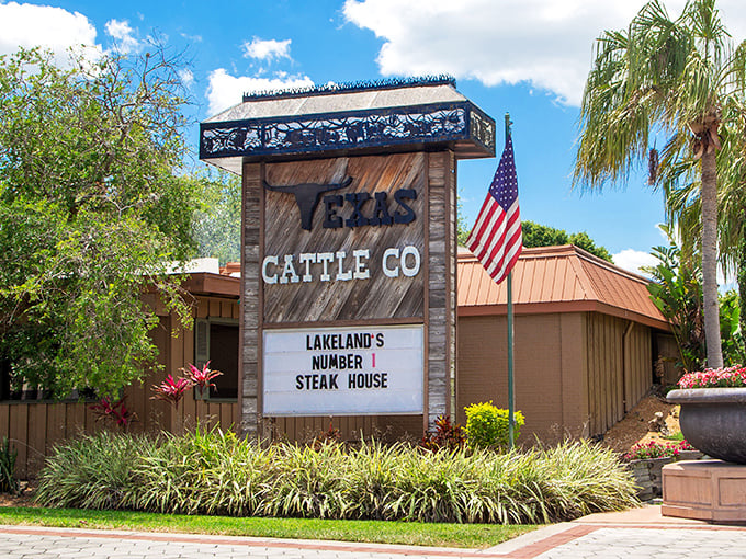 "Lakeland's Number 1 Steak House" proclaims the sign, surrounded by tropical landscaping. Where Texas tradition meets Florida charm in delicious harmony.
