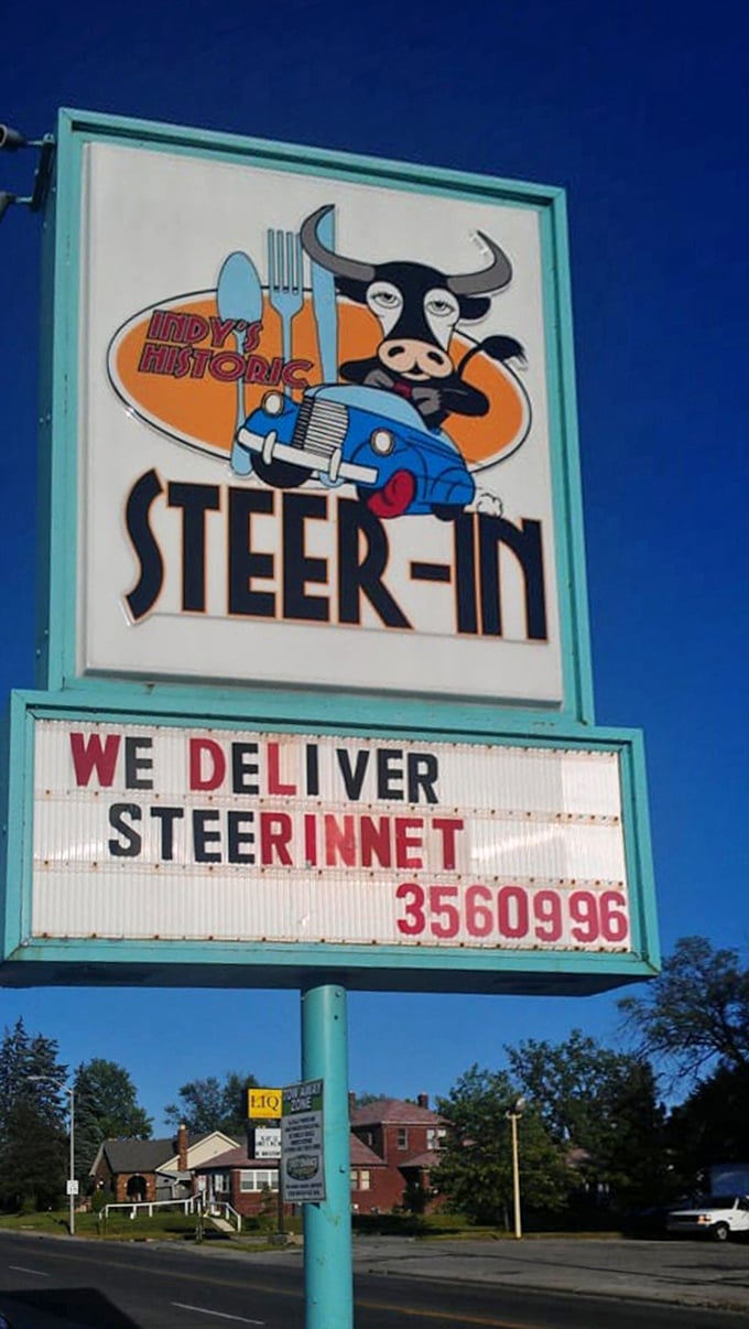 A cartoon cow with attitude! This vintage sign doesn't just mark a restaurant—it announces an Indianapolis institution that delivers on its promises.