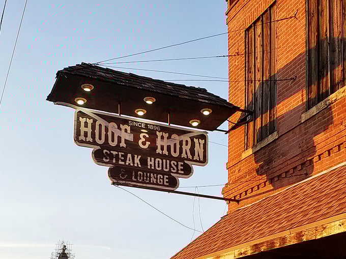 The vintage sign doesn't just mark a restaurant—it's a beacon for hungry travelers and locals alike, promising beef-based happiness since 1954. 