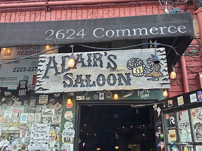 That weathered wooden sign doesn't need neon or flash—like the burgers served beneath it, it's straightforward, authentic, and instantly recognizable.