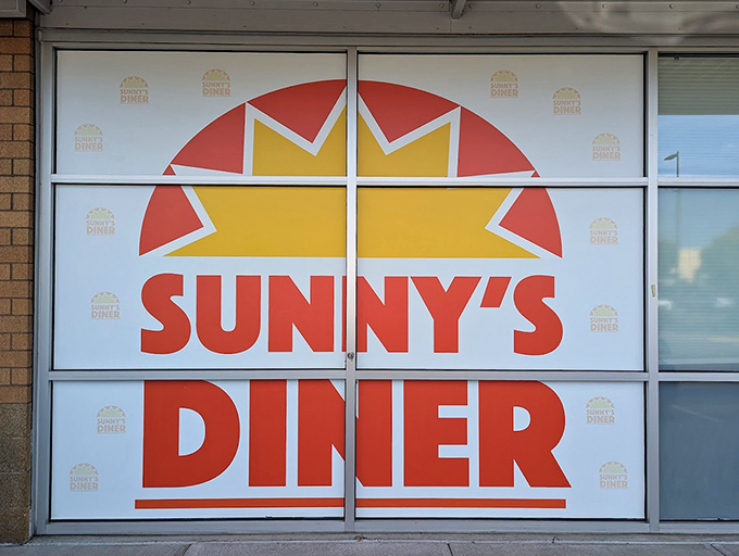 The logo says it all – a rising sun promising that no matter how cloudy Oregon gets, breakfast optimism awaits inside.