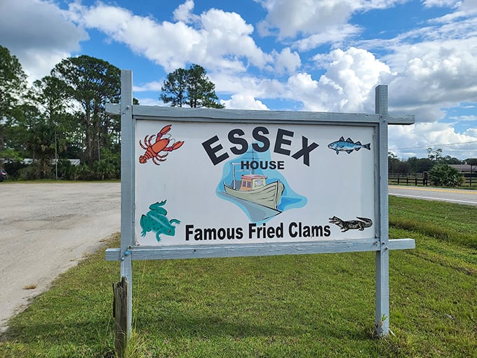 The sign says it all—"Famous Fried Clams" isn't just advertising, it's a promise that's kept with every golden, crispy batch that leaves the kitchen.