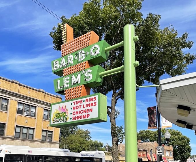 That green and orange sign against the blue Chicago sky isn't just advertising—it's a landmark that's guided hungry travelers for generations.