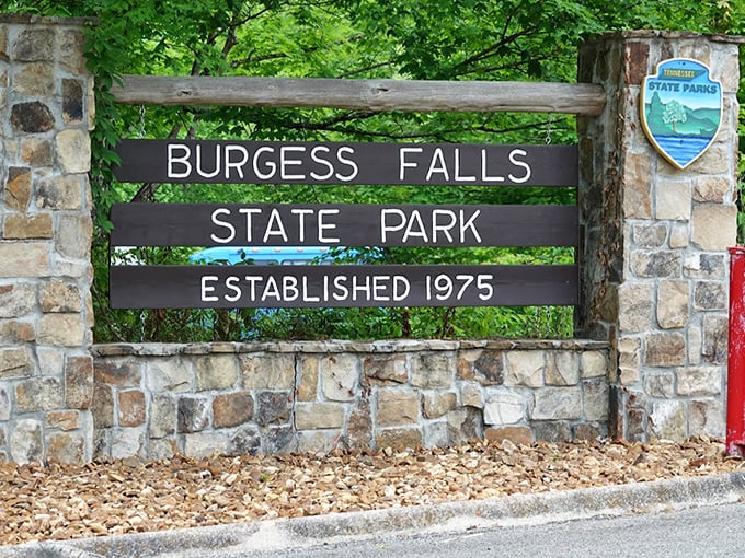 The park entrance sign – your official invitation to one of Tennessee's most spectacular natural performances, running continuously since 1975.