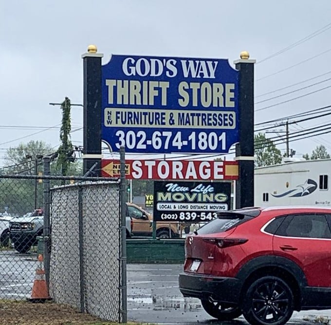 The roadside sign beckons bargain hunters like a lighthouse guiding ships to safe harbor—and spectacular savings.