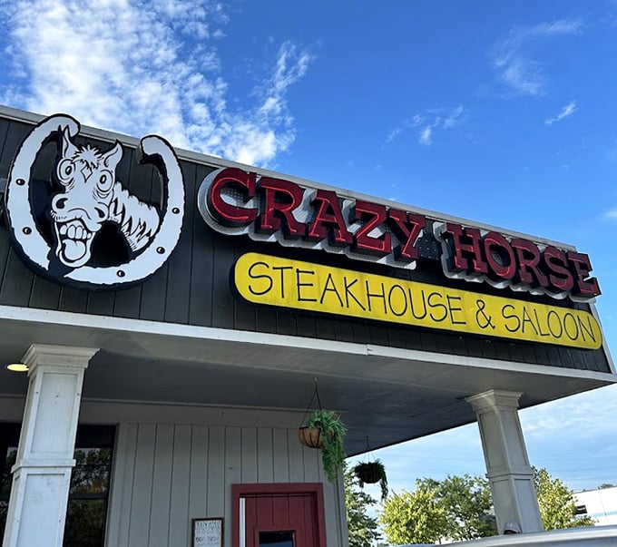 That grinning horse logo promises exactly what's delivered inside – serious fun paired with seriously good food in Holland, Michigan.